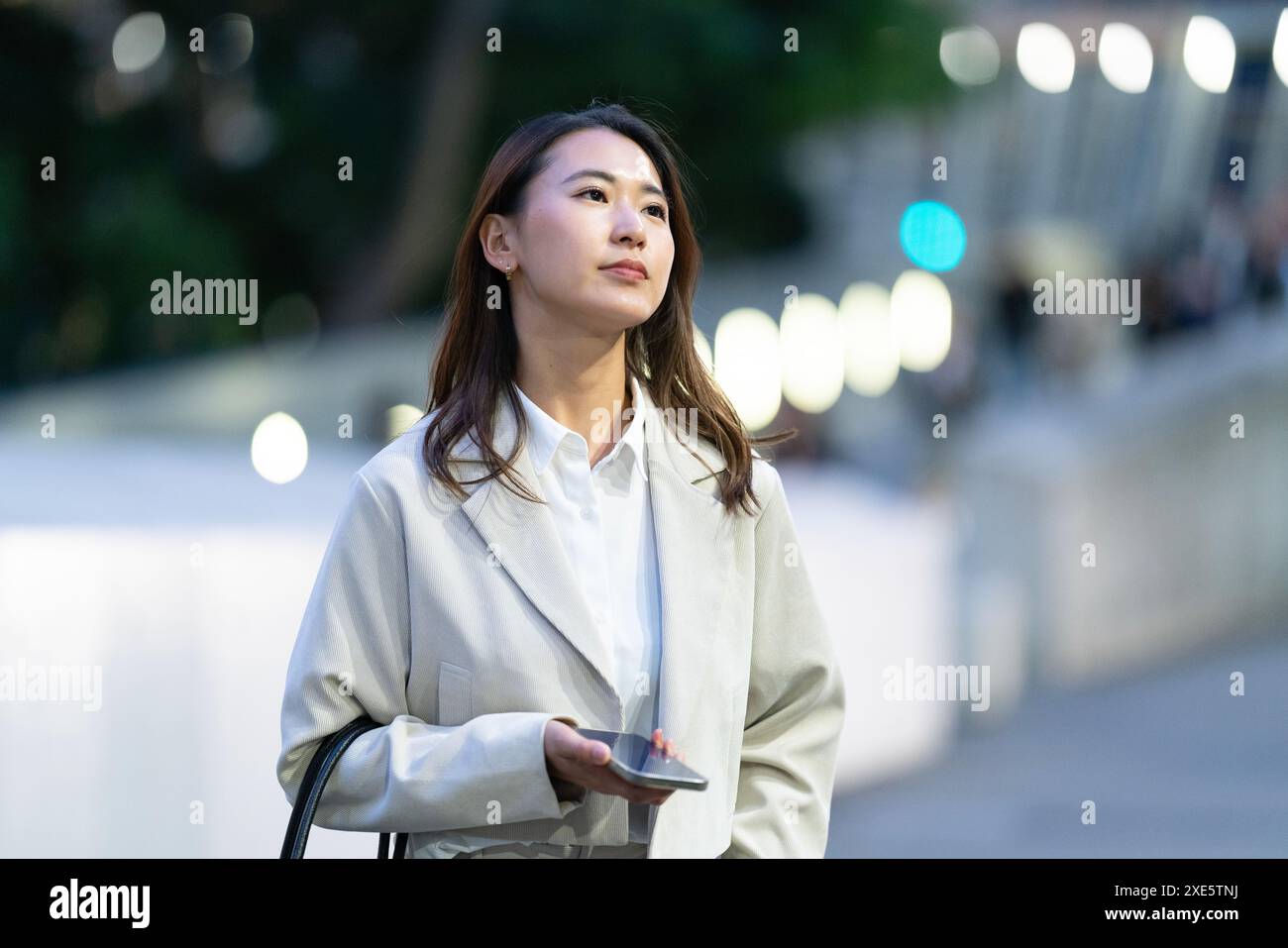 Woman leaving for work night hi-res stock photography and images - Alamy