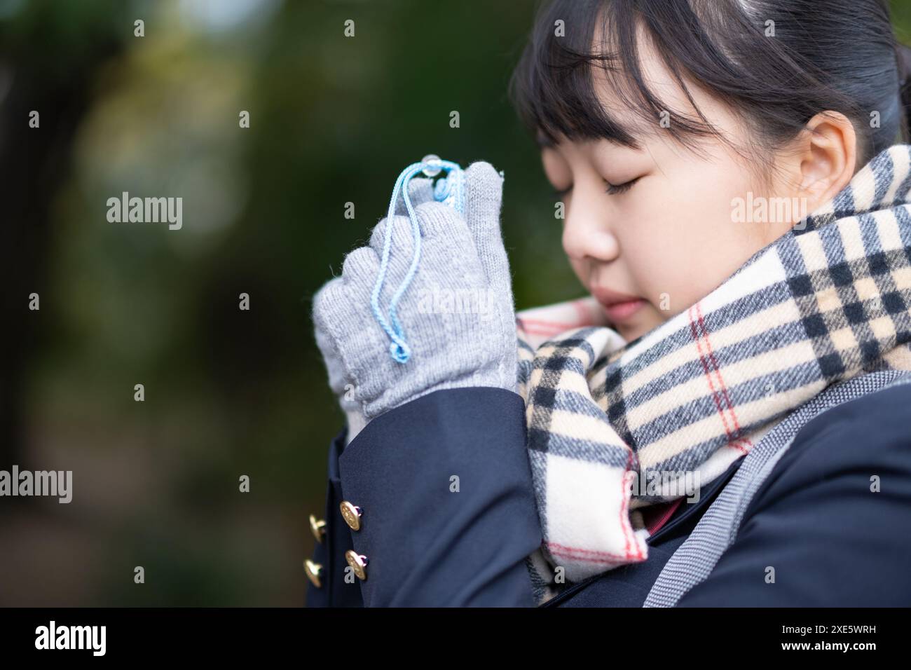 Student praying for success Stock Photo - Alamy