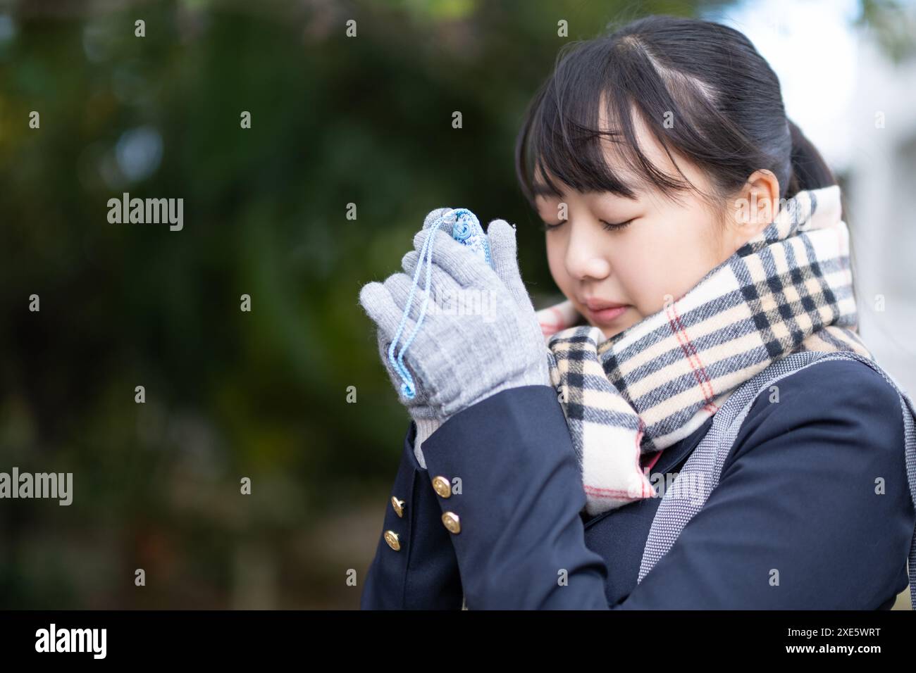 Student praying for success Stock Photo - Alamy