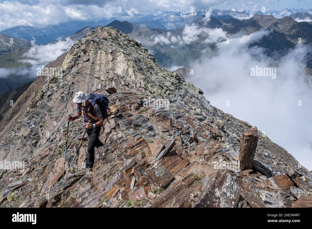 Ascent to Batoua peak by ridge Stock Photo - Alamy
