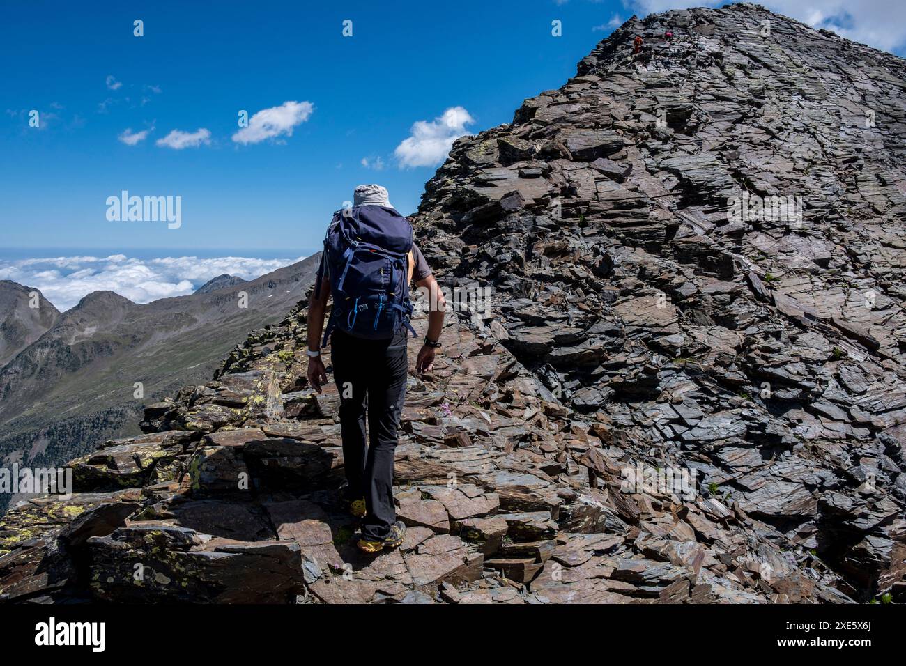 Ascent to Batoua peak by ridge Stock Photo - Alamy