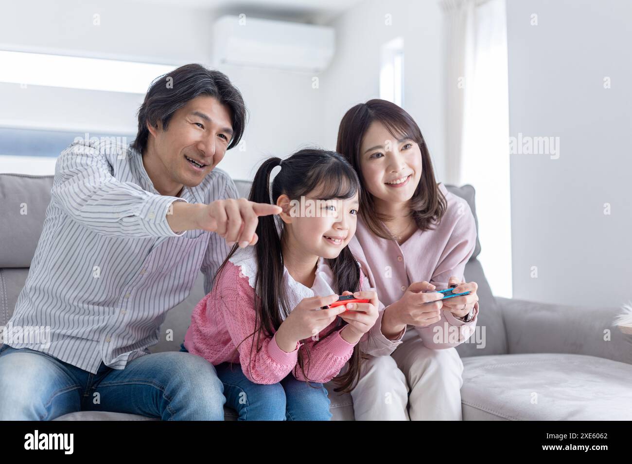 Japanese child playing video games hi-res stock photography and images ...