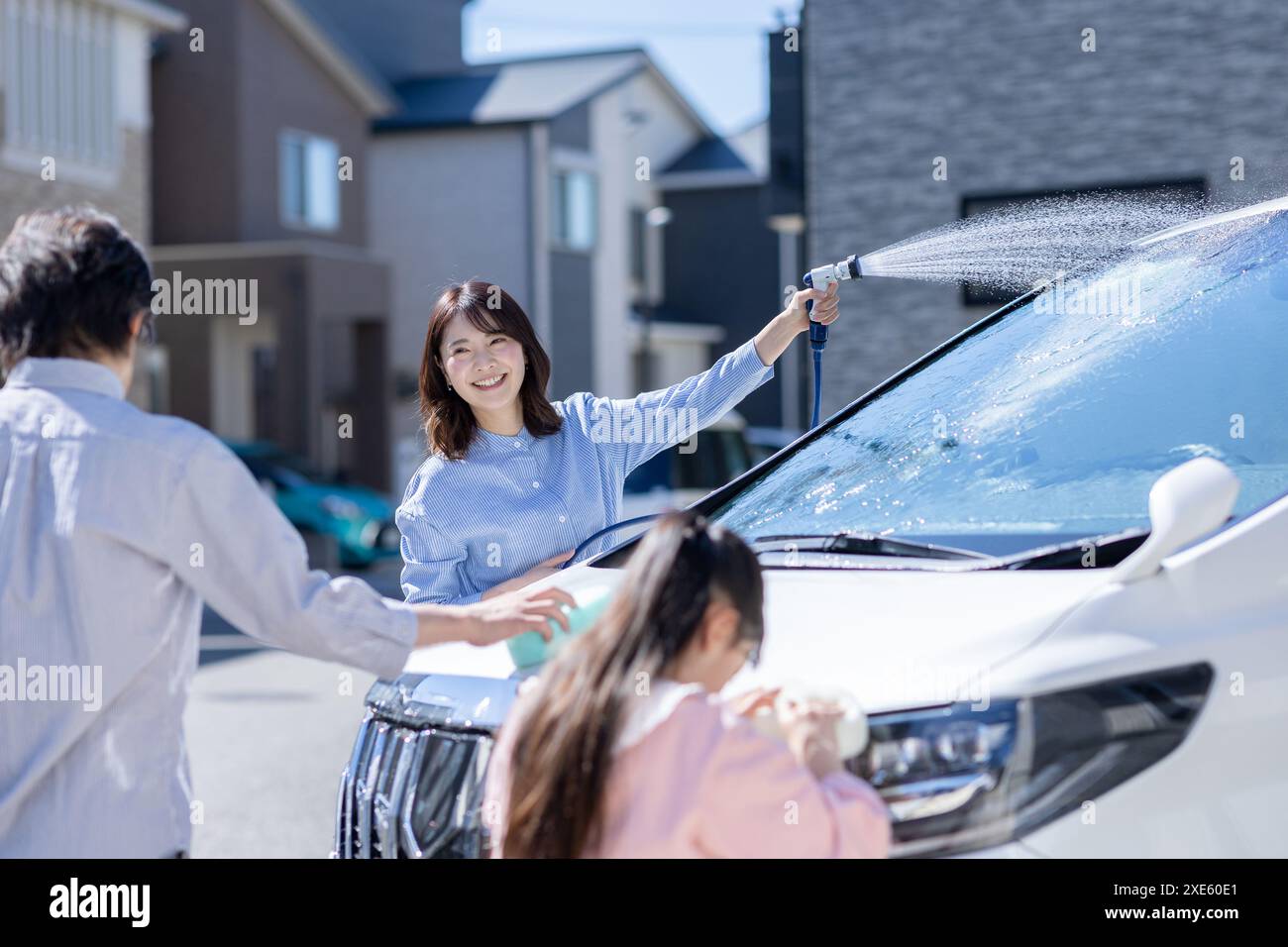 Family washing their car Stock Photo - Alamy