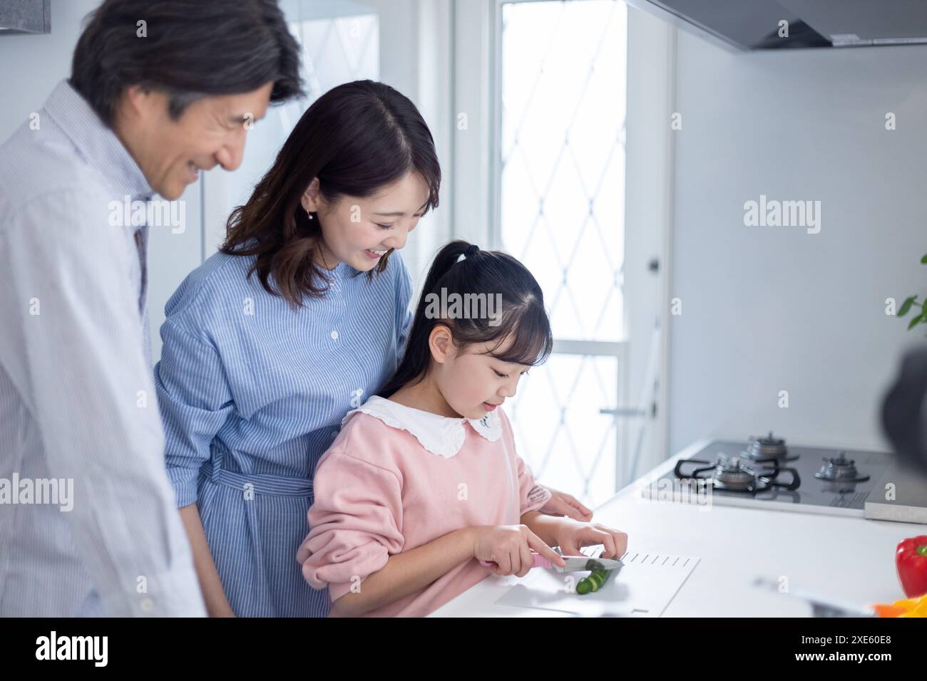 Girl cutting vegetables Stock Photo - Alamy