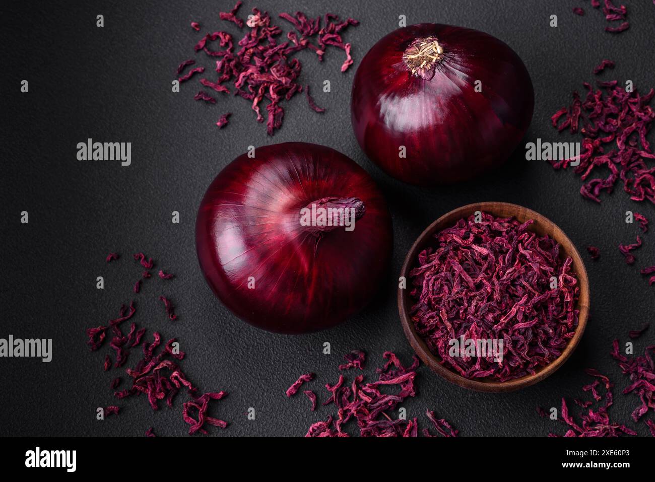 Fresh raw red onion on dark textured concrete background Stock Photo ...