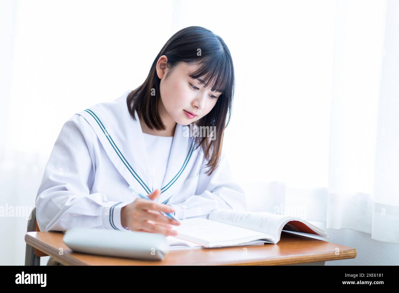 Student taking a class Stock Photo - Alamy