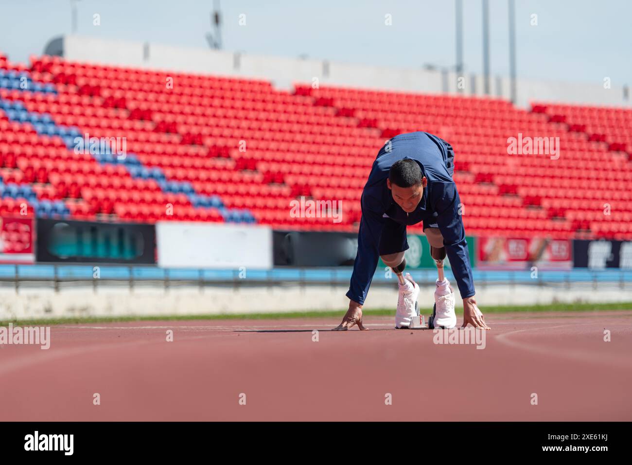 Runner in starting position hi-res stock photography and images - Alamy