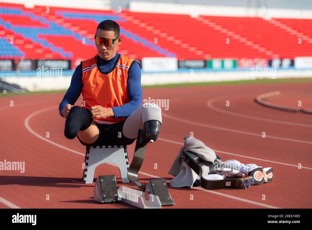 Disabled athletes prepare in starting position ready to run on stadium ...