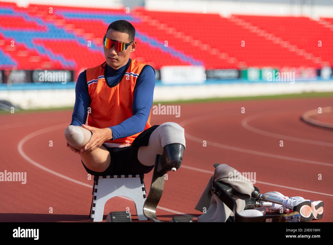 Disabled athletes prepare in starting position ready to run on stadium ...