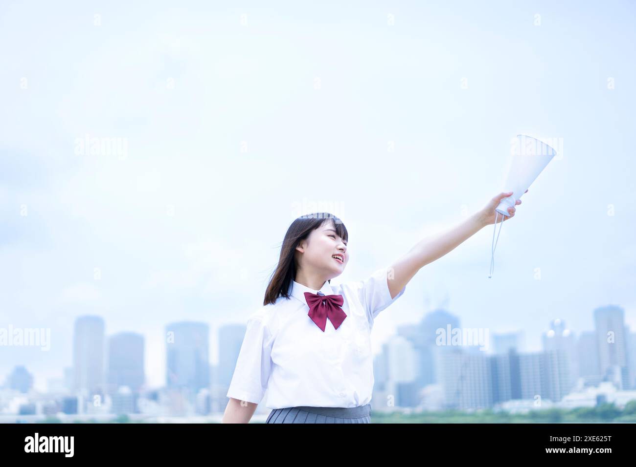 High school girl with megaphone Stock Photo - Alamy