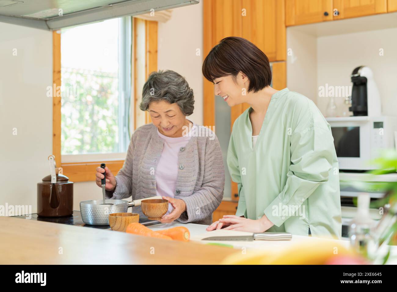 Grandson learning cook from hi-res stock photography and images - Alamy