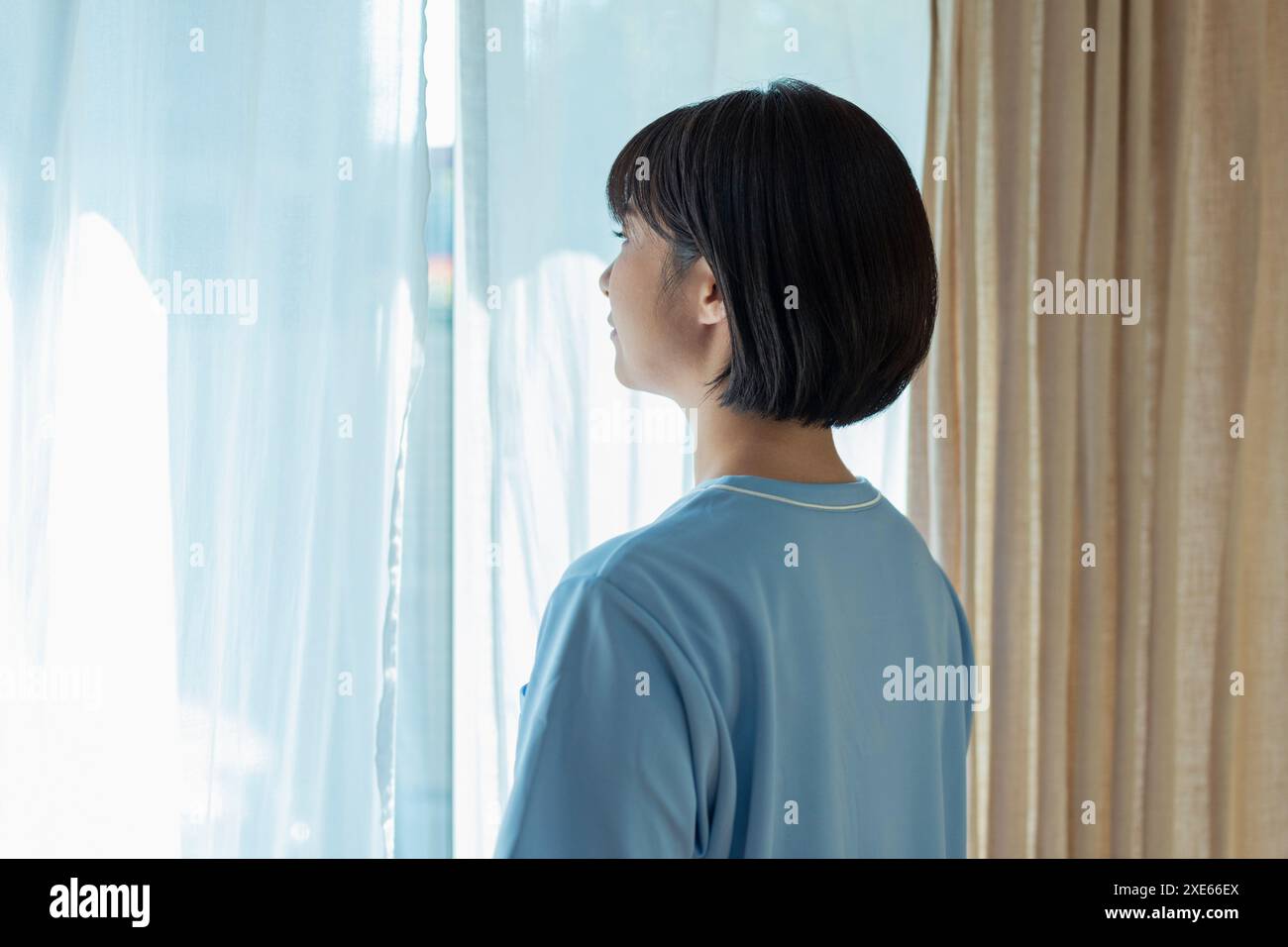Distressed female health care worker Stock Photo - Alamy