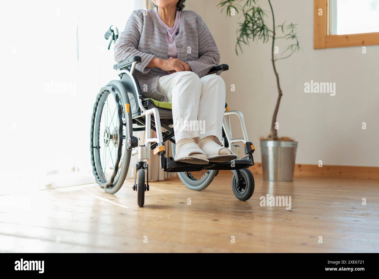 Senior woman in wheelchair Stock Photo - Alamy