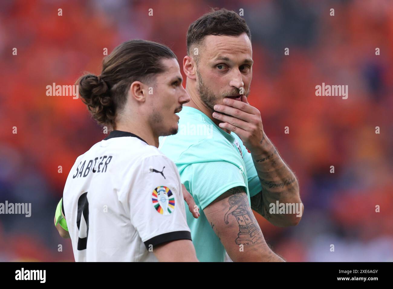 BERLIN, GERMANY - JUNE 25: Marko Arnautovic of Austria and Marcel ...