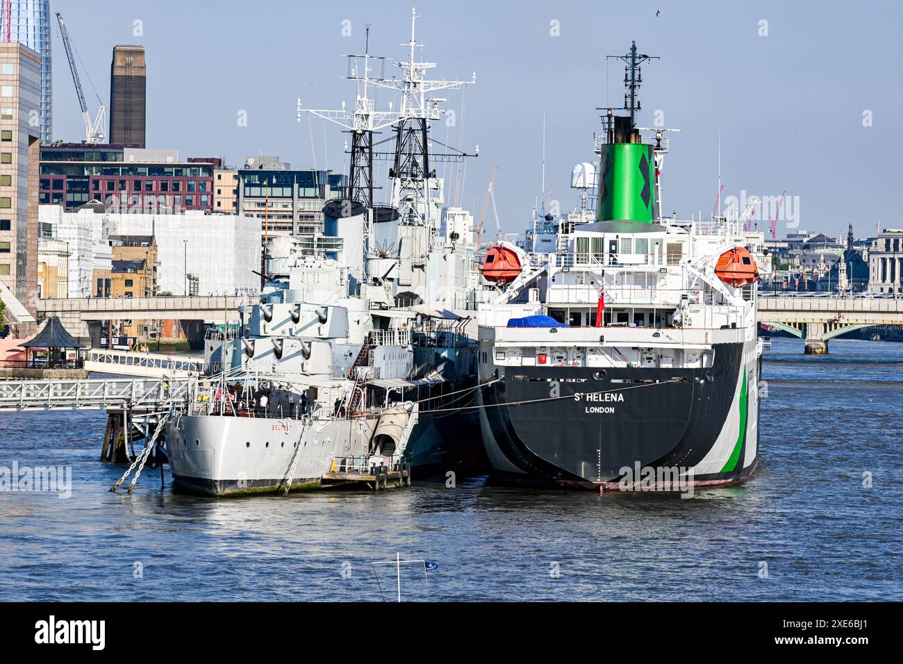 EDITORIAL USE ONLY St Helena docks next to HMS Belfast after passing ...