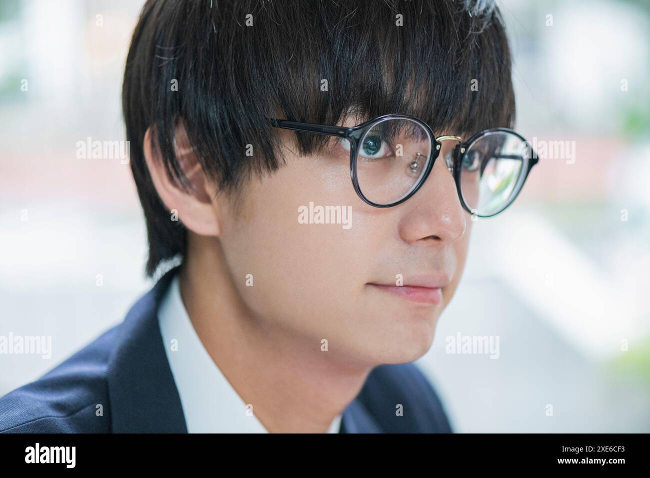 High school boy taking a class at a prep school Stock Photo - Alamy