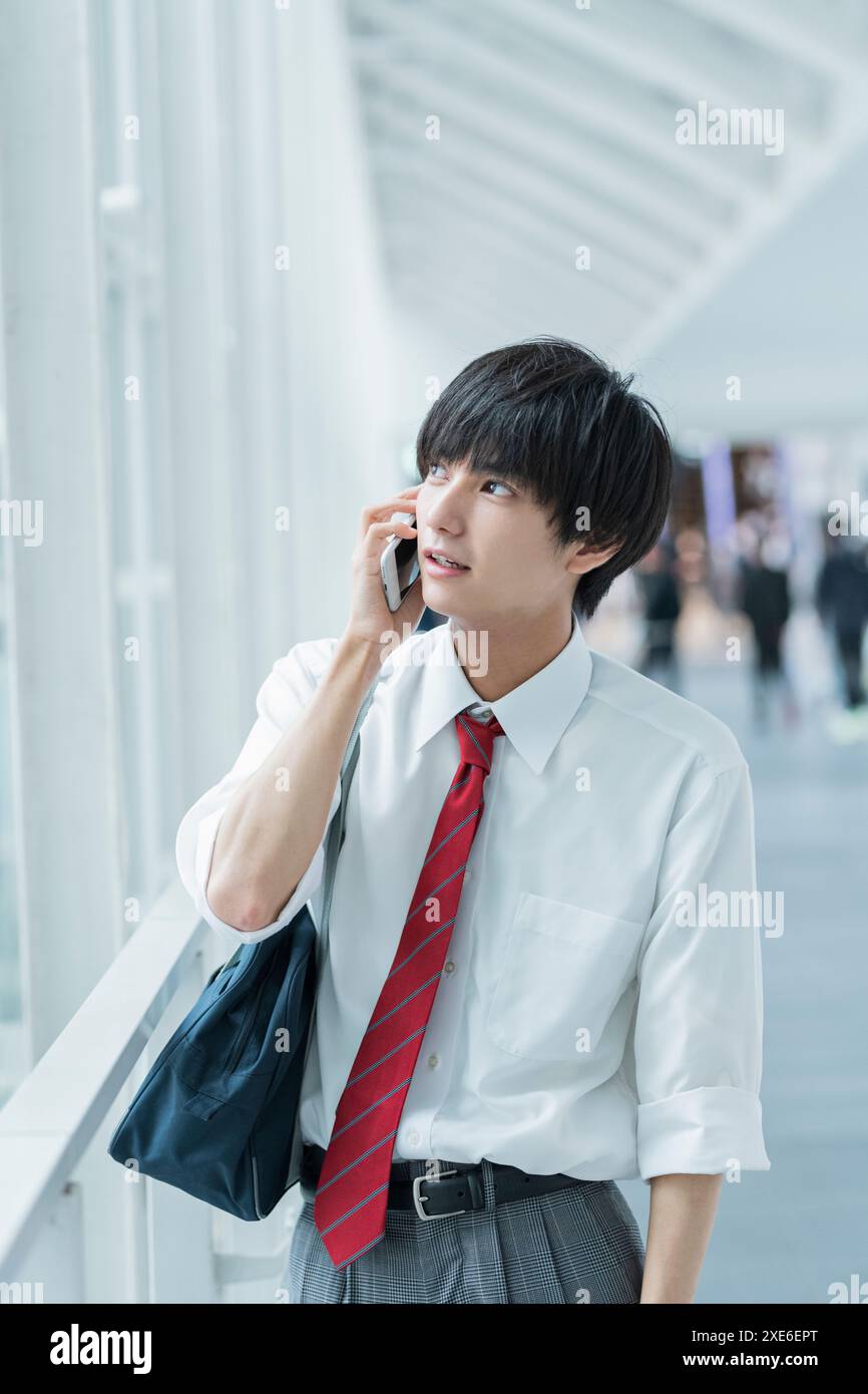 School boy calling hi-res stock photography and images - Alamy