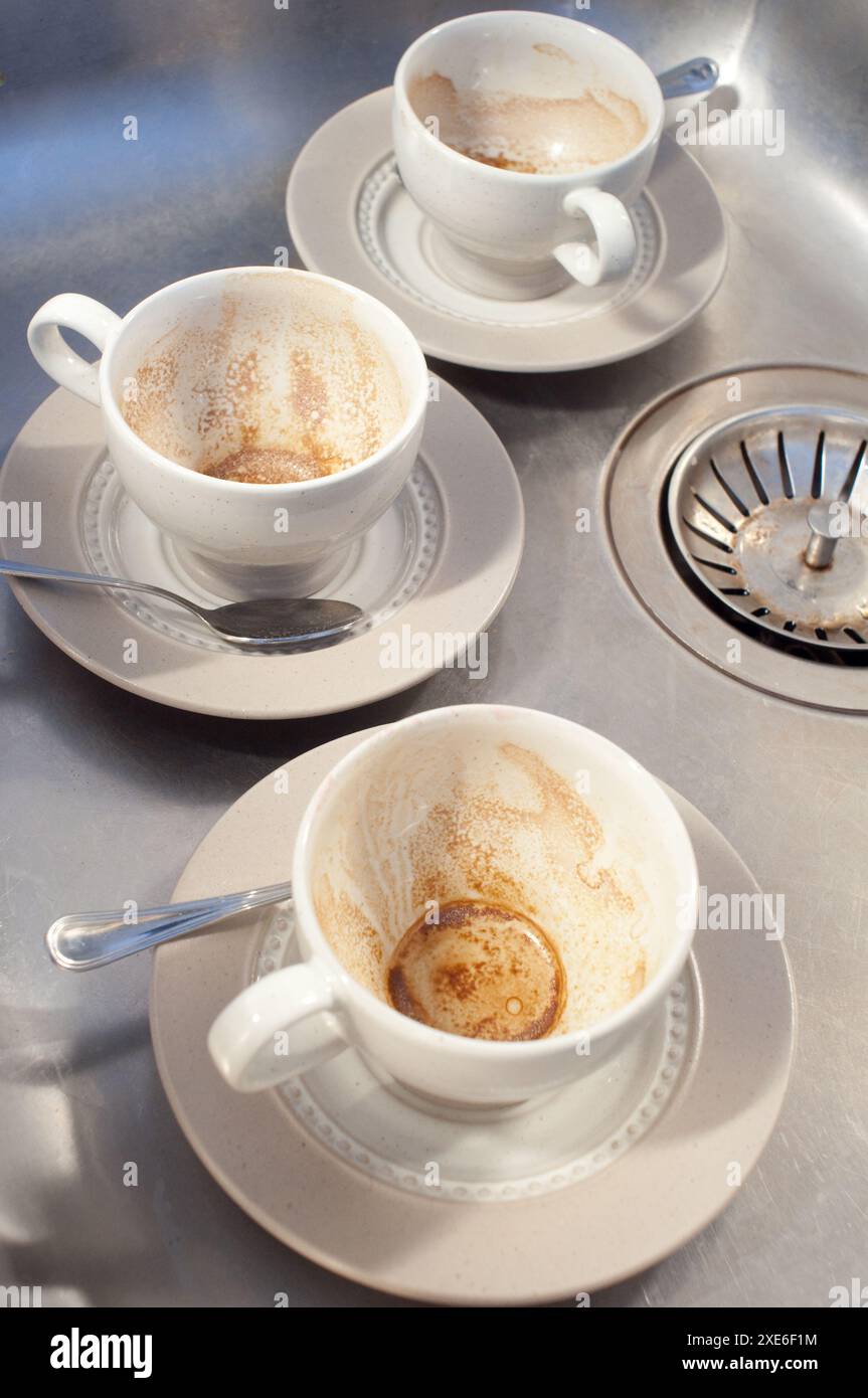Coffee Cup in Sink Stock Photo - Alamy