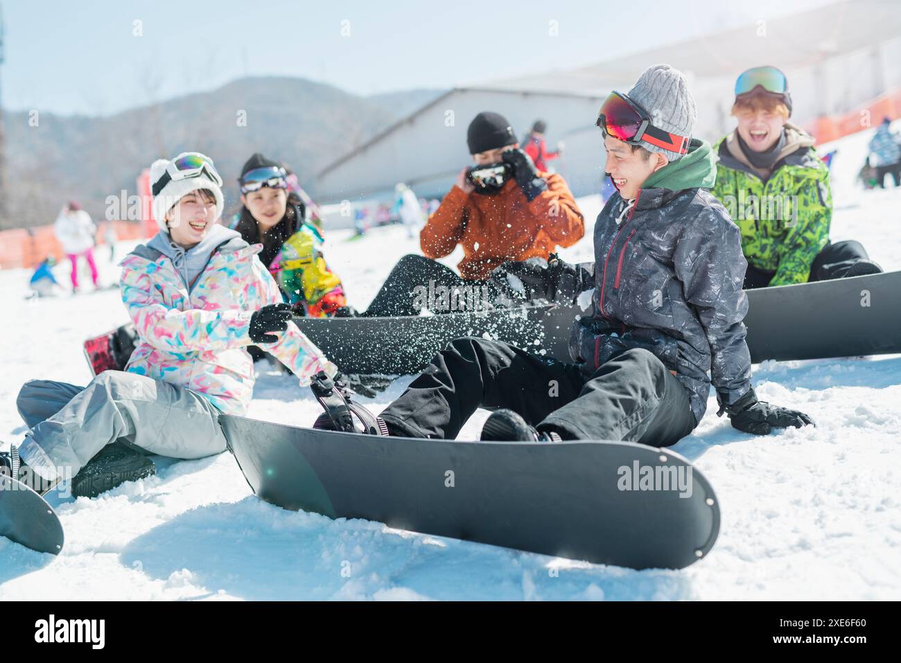 University students playing on a ski slope Stock Photo - Alamy