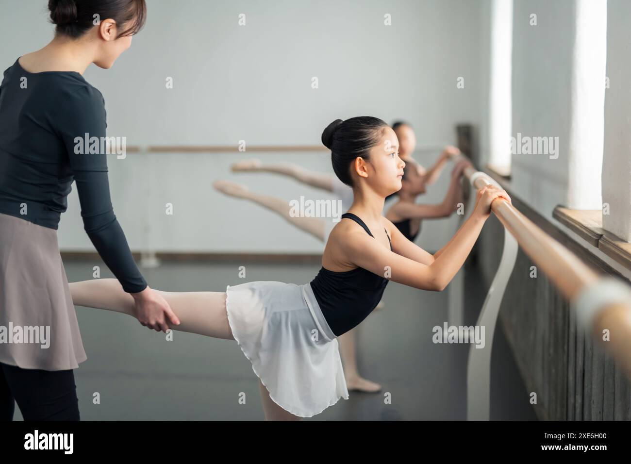 Ballet class, instructor and children Stock Photo - Alamy