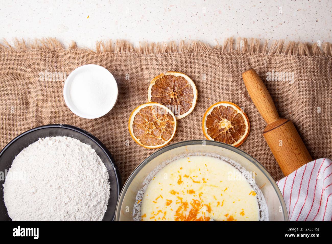 Blending Orange Peel with Basic Baking Ingredients Stock Photo - Alamy