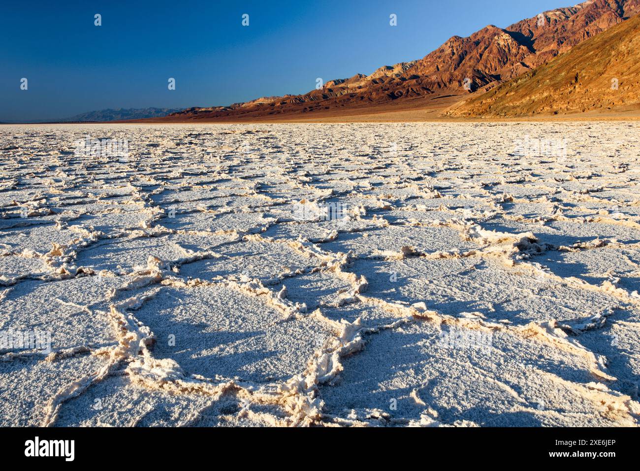Salt crusts at the Badwater Basin salt flats in the Death Valley which ...