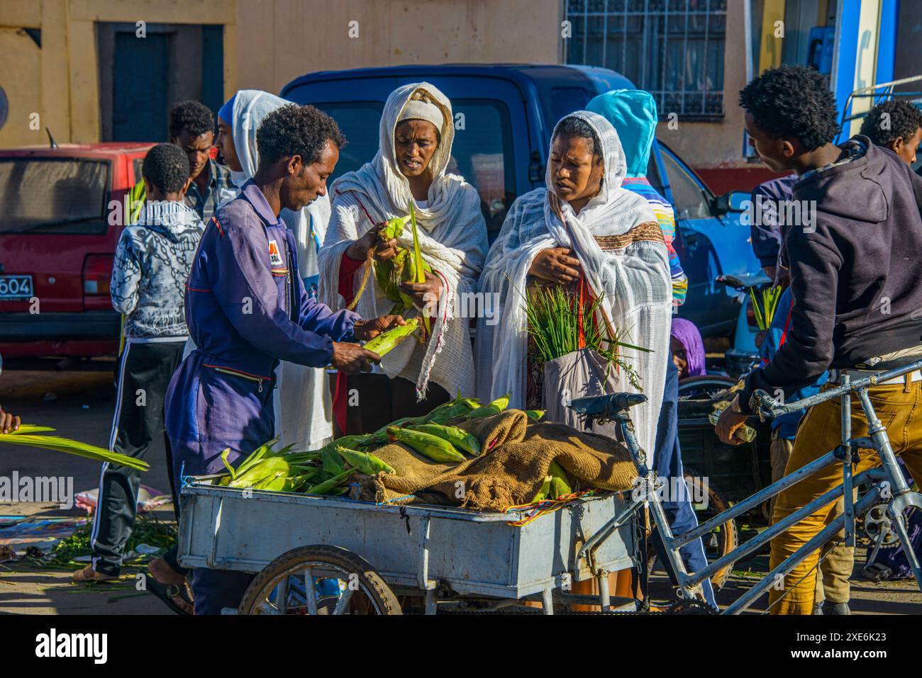 Orthodox dressed woman buying vegetables, Asmara, Eritrea, Africa ...