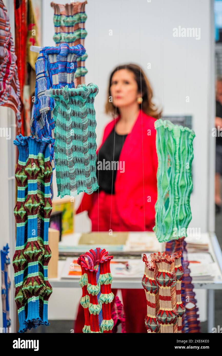 London, UK. 26th June, 2024. Textiles by Sarah Addison - New Designers ...