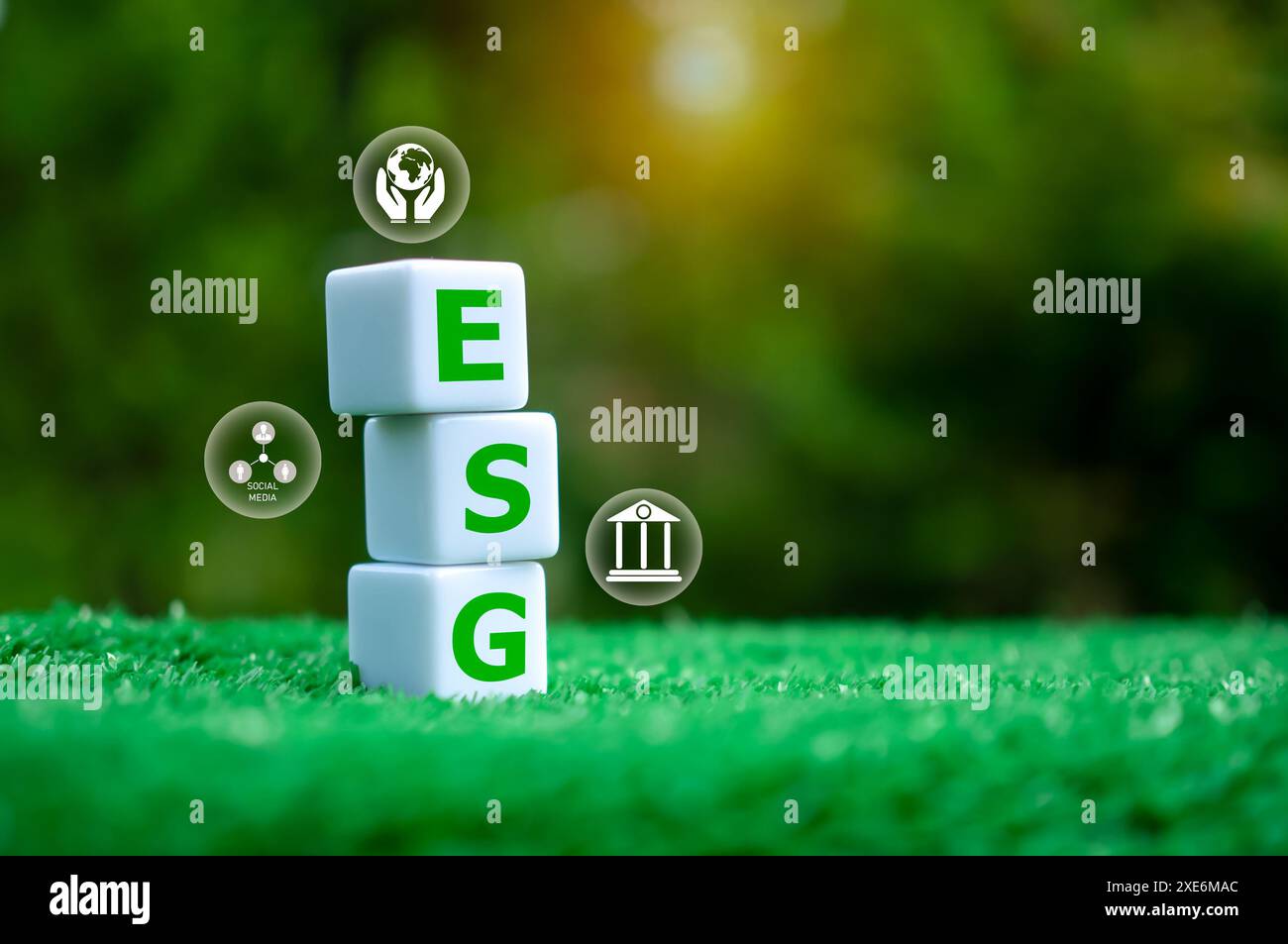 A group of three white cubes with the letters ESG written on them, The ...