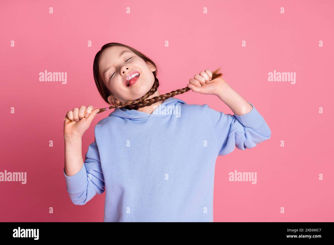 Portrait of cute little schoolkid braids choke neck wear hoodie ...