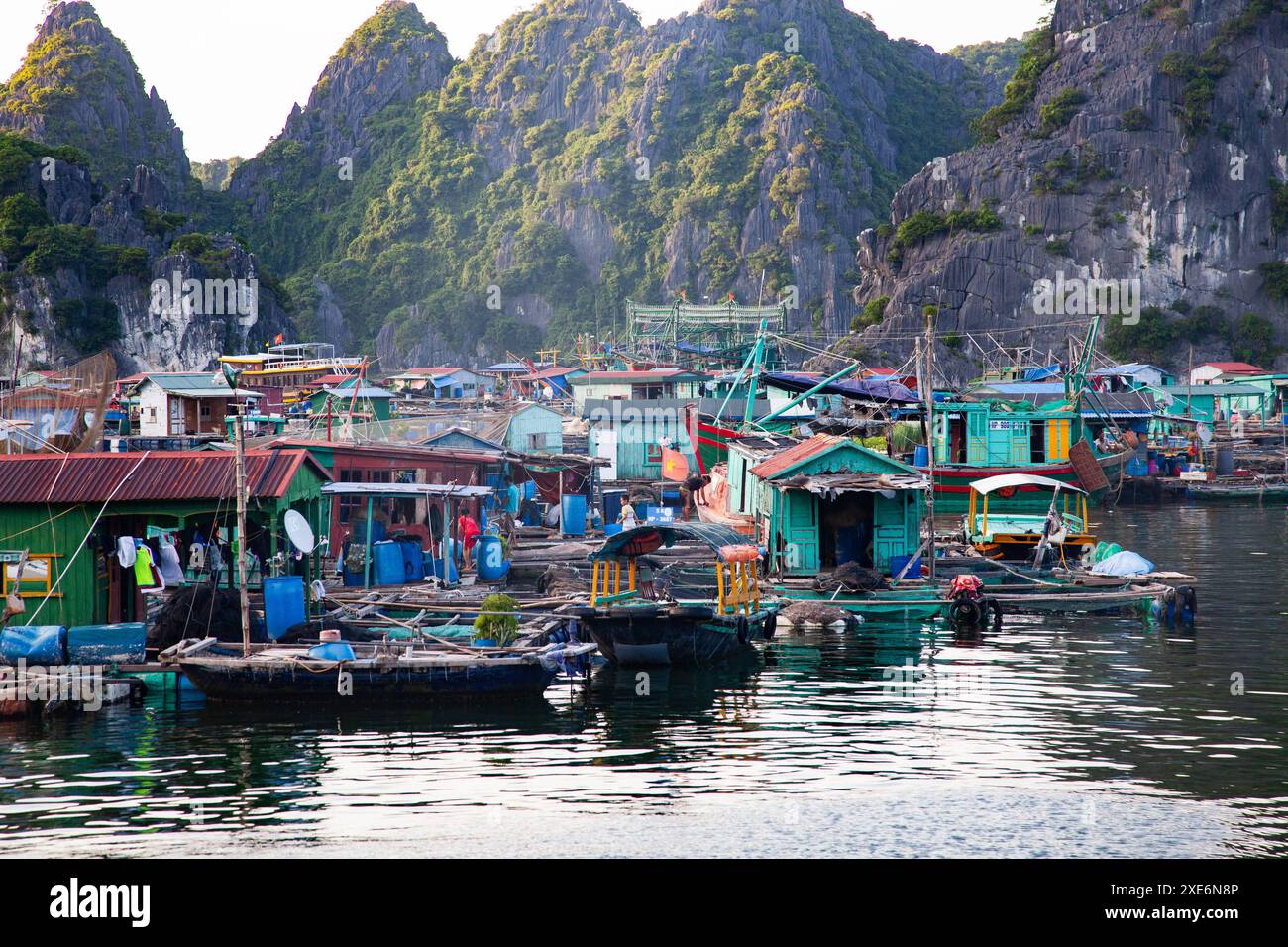 Ha Long Bay from Cat Ba island, Ha Long city in the background, UNESCO ...