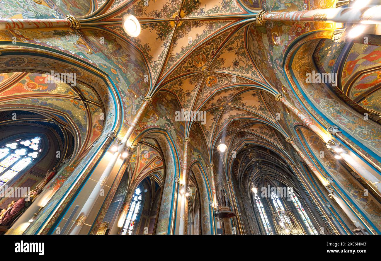 Stunning frescoes adorning the vaulted ceiling of Basilica of Sts Peter ...