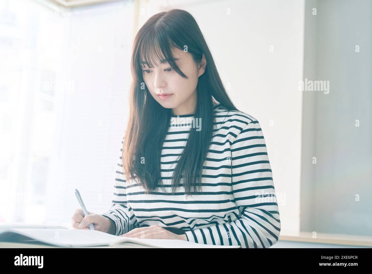 Young black man taking notes hi-res stock photography and images - Alamy