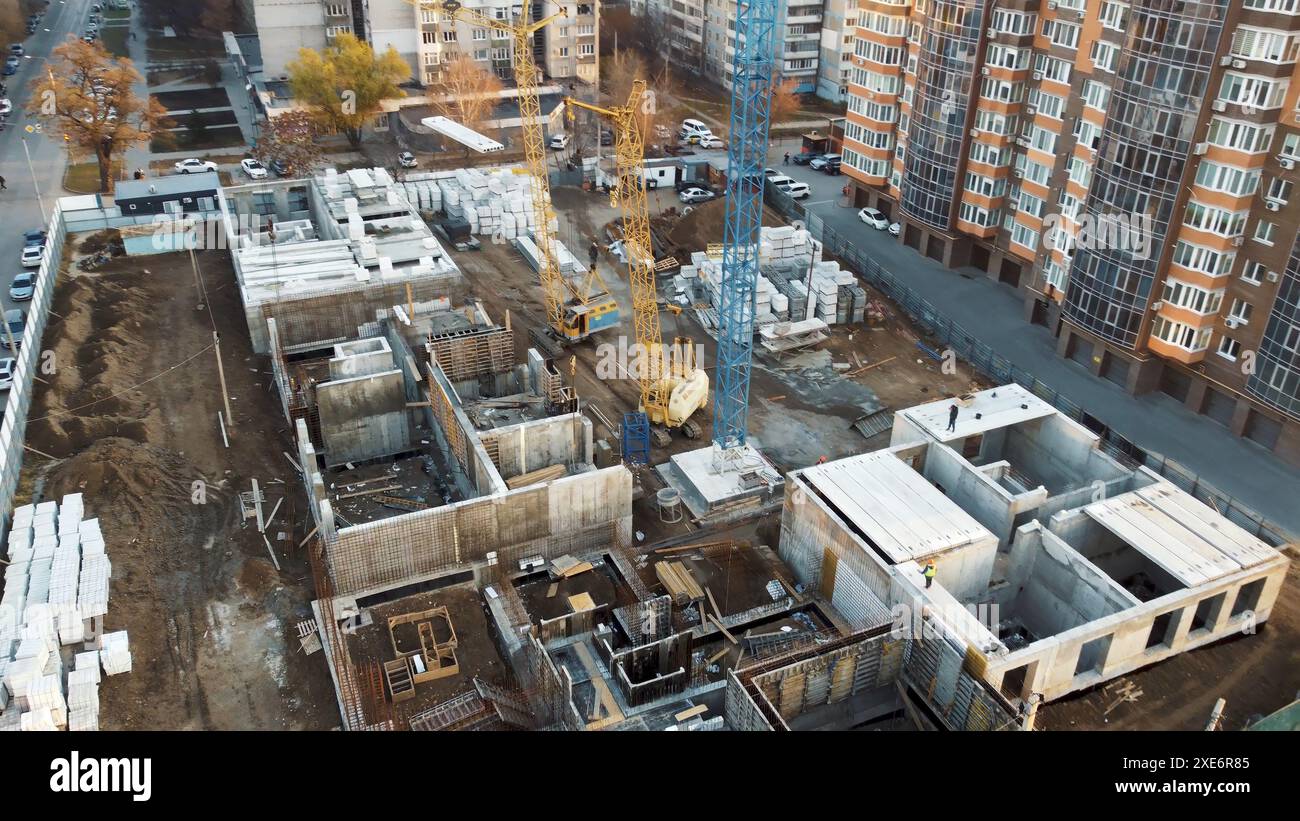The surrounding area is a mix of completed high-rise buildings and ...