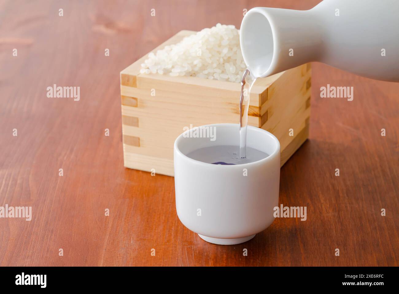 Rice and sake Stock Photo - Alamy