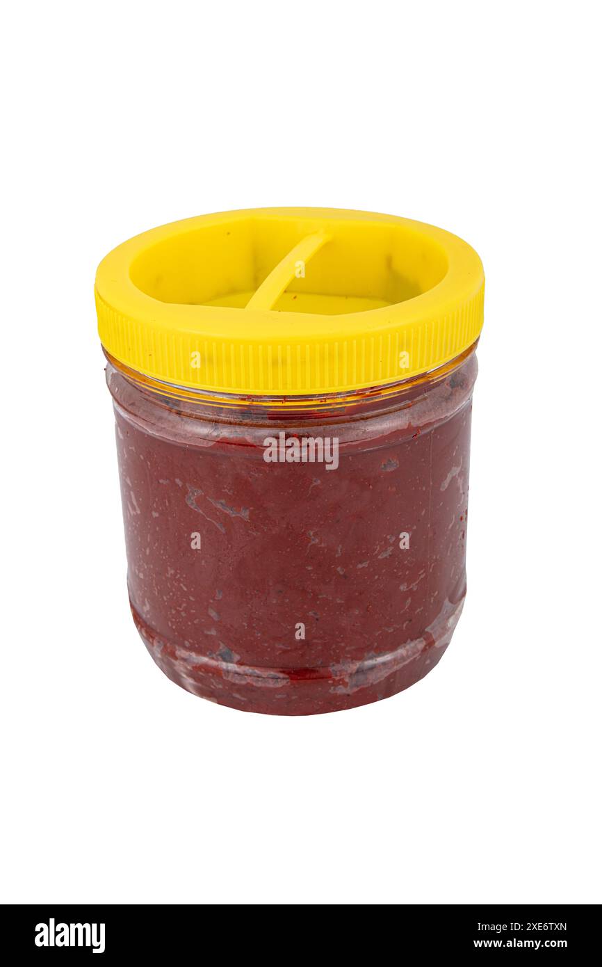 Hot pepper paste in plastic jar isolated on white background. Plastic ...