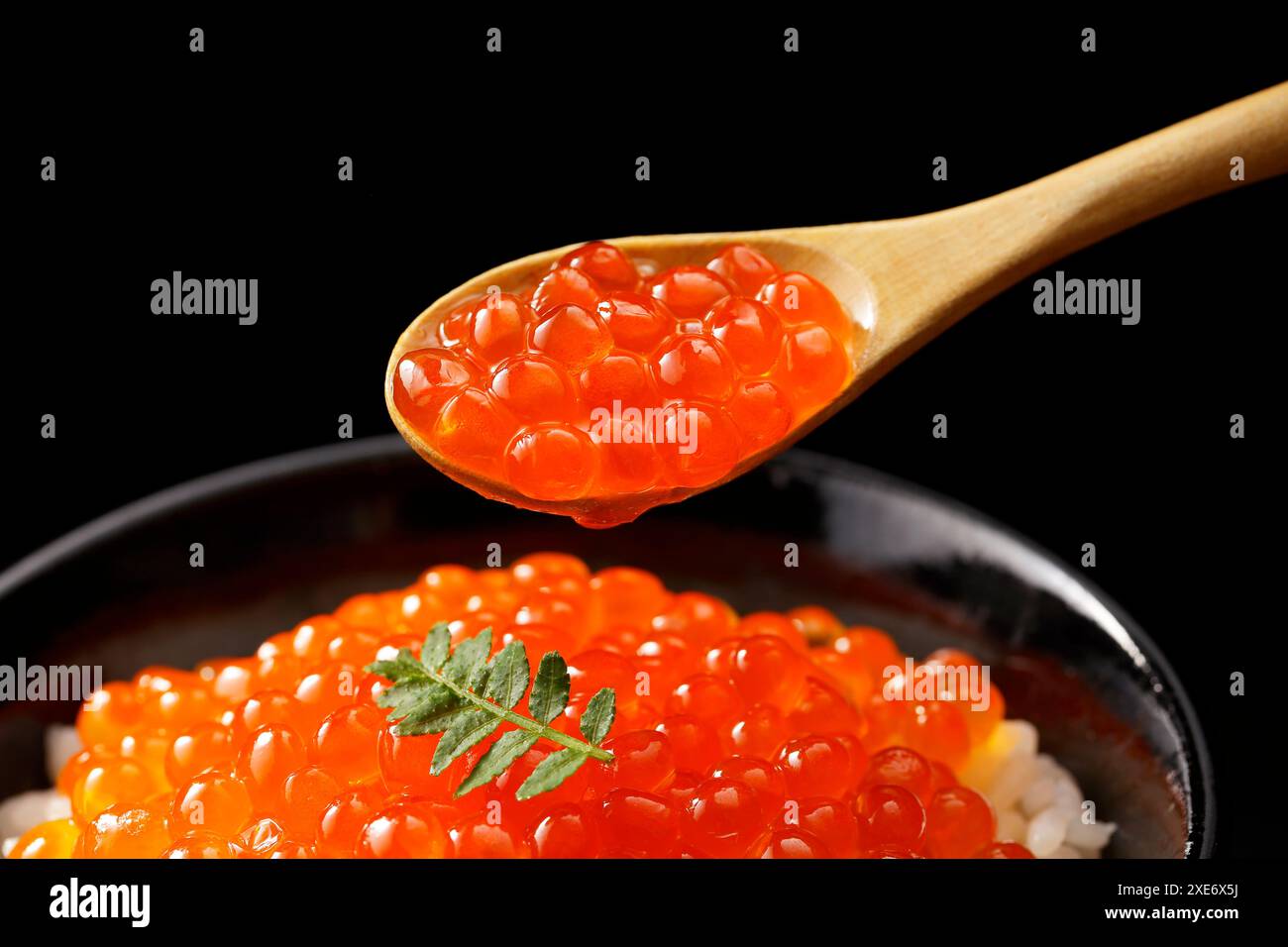 Soaked salmon roe in soy sauce on rice Stock Photo - Alamy