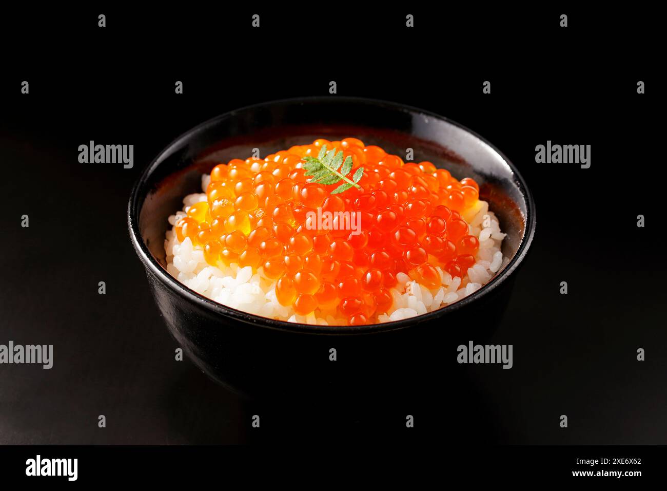 Soaked salmon roe in soy sauce on rice Stock Photo - Alamy