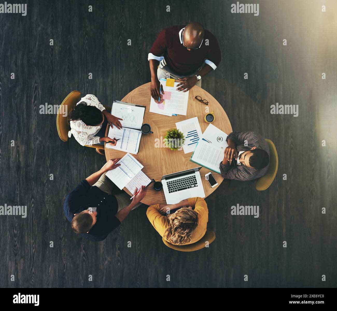 Top view, business people and brainstorming with paperwork, charts and ...