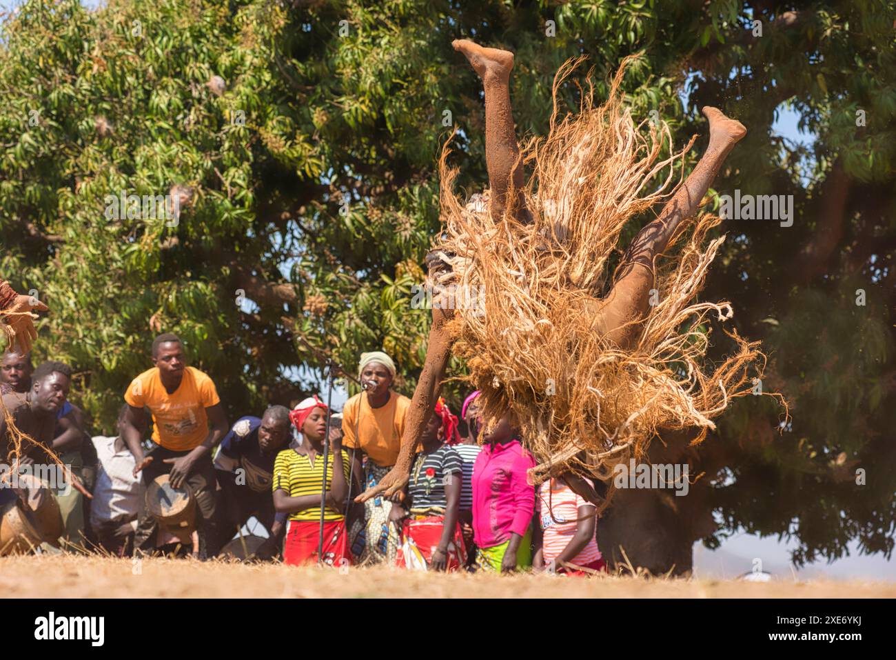 Masked dancer somersaulting, The Kulamba Traditional Ceremony of the ...