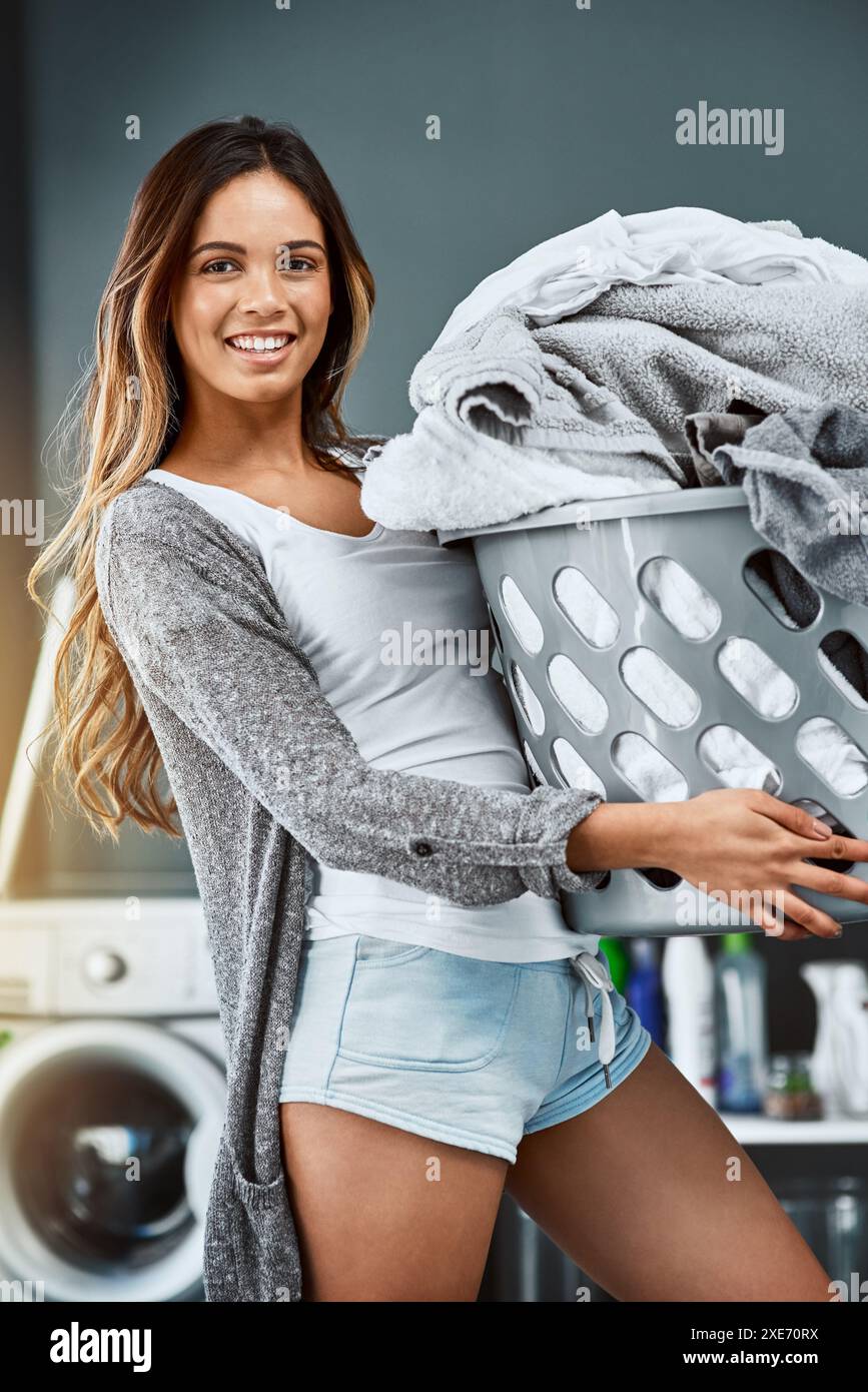 Woman, laundry basket and washing in home portrait, hygiene and clothes ...