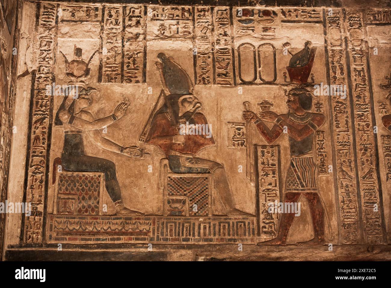 Reliefs of the Goddess Hathor on left with God Horus in the middle, and ...