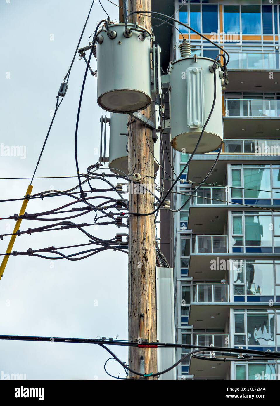 Power transformers mounted on wooden pole Stock Photo - Alamy