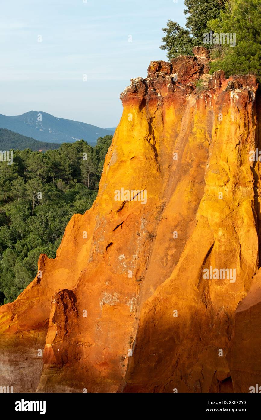 View of ochre cliffs and surrounding landscape, photographed from the ...