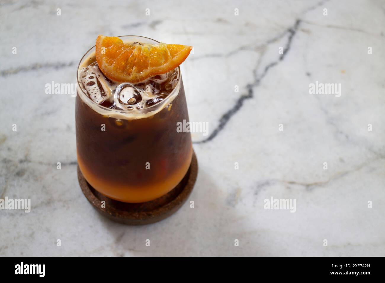 Orange juice espresso with ice, stock photo Stock Photo - Alamy