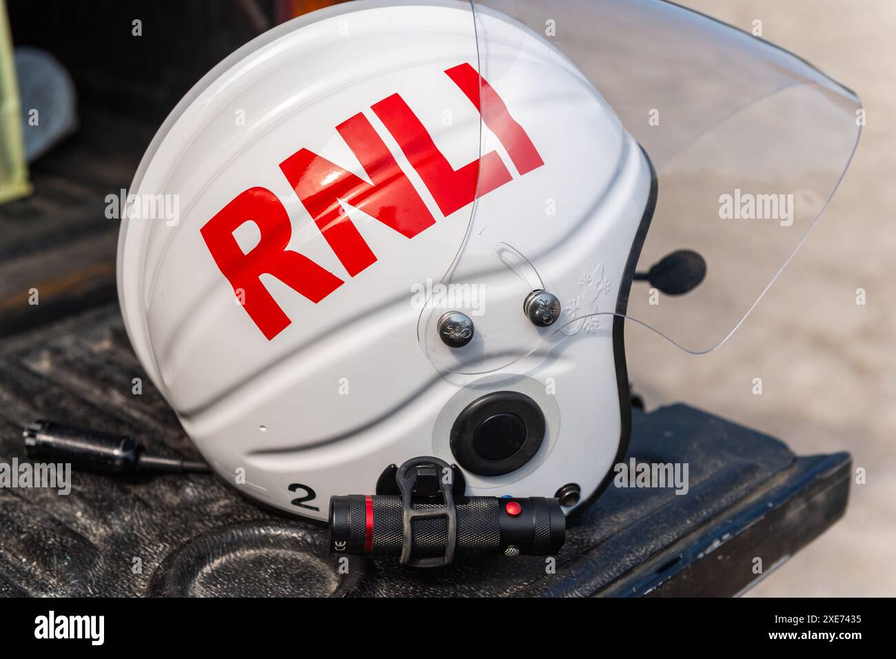RNLI crew member's helmet, Ireland Stock Photo - Alamy