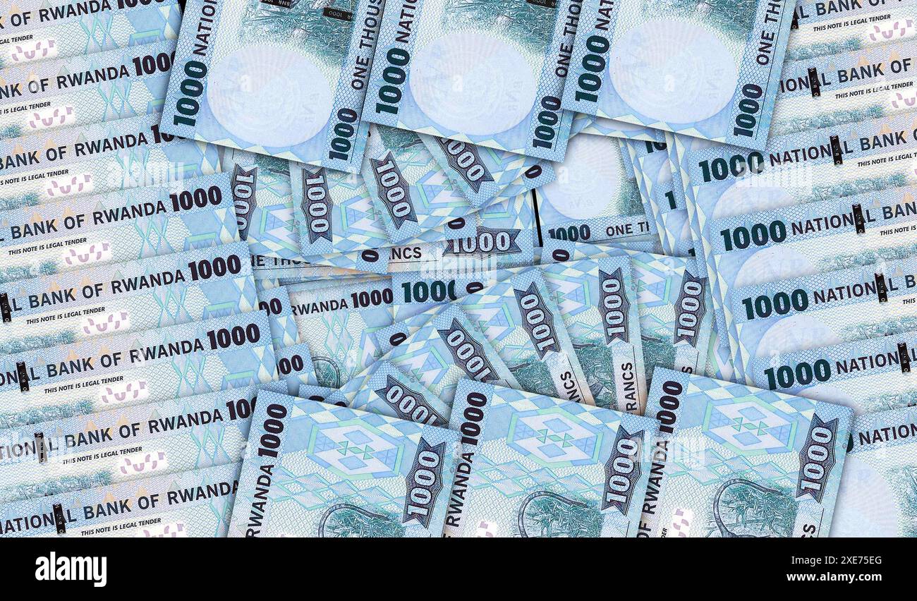 Rwanda Franc banknotes in a cash fan mosaic pattern. Rwandan RWF 1000 ...