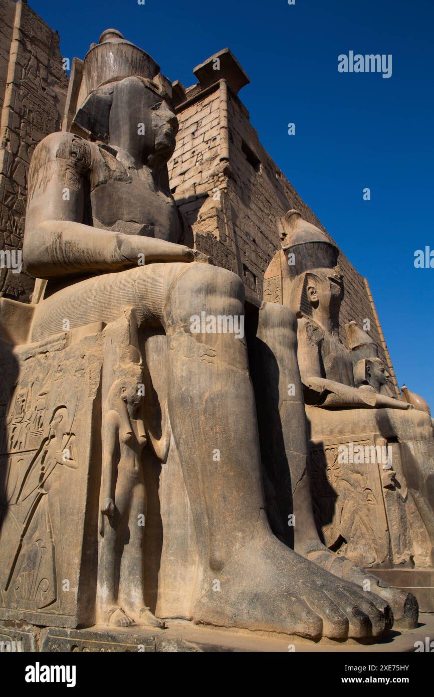 Statues of Rameses II with Nefertari below, Luxor Temple, UNESCO World ...