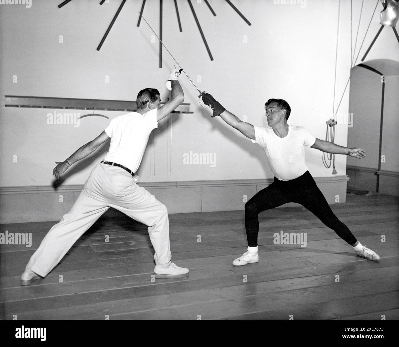 STEWART GRANGER having fencing / sword fighting lessons with Belgian ...