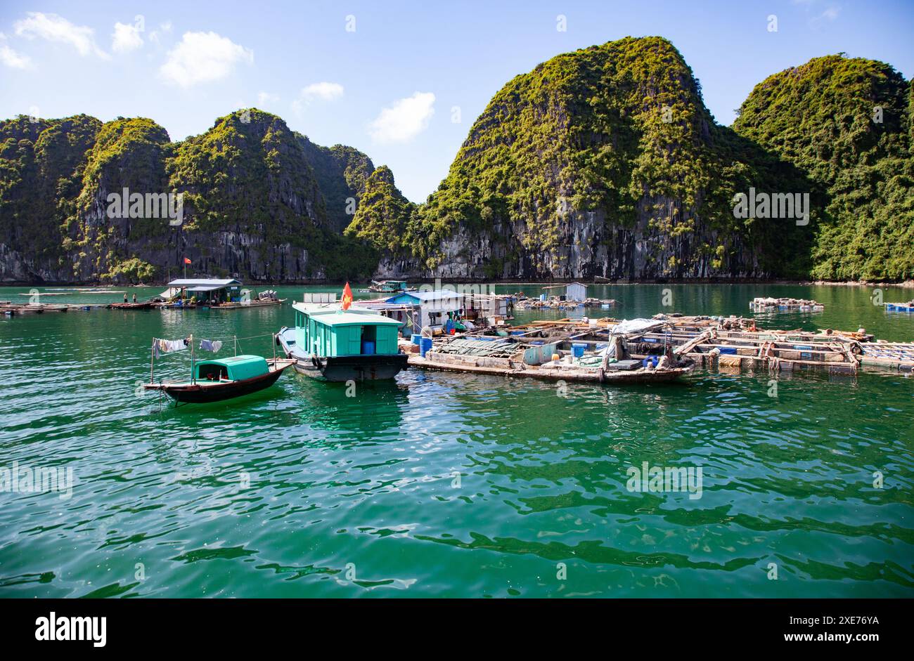 Ha Long Bay from Cat Ba island, Ha Long city in the background, UNESCO ...